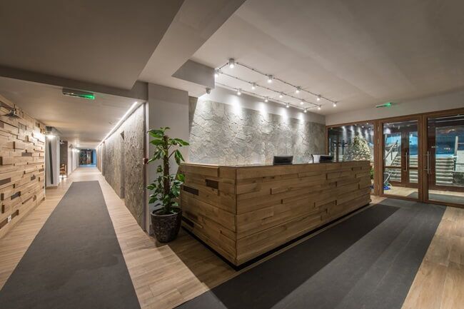 Transformative Lobby Millwork by Remmert & Company